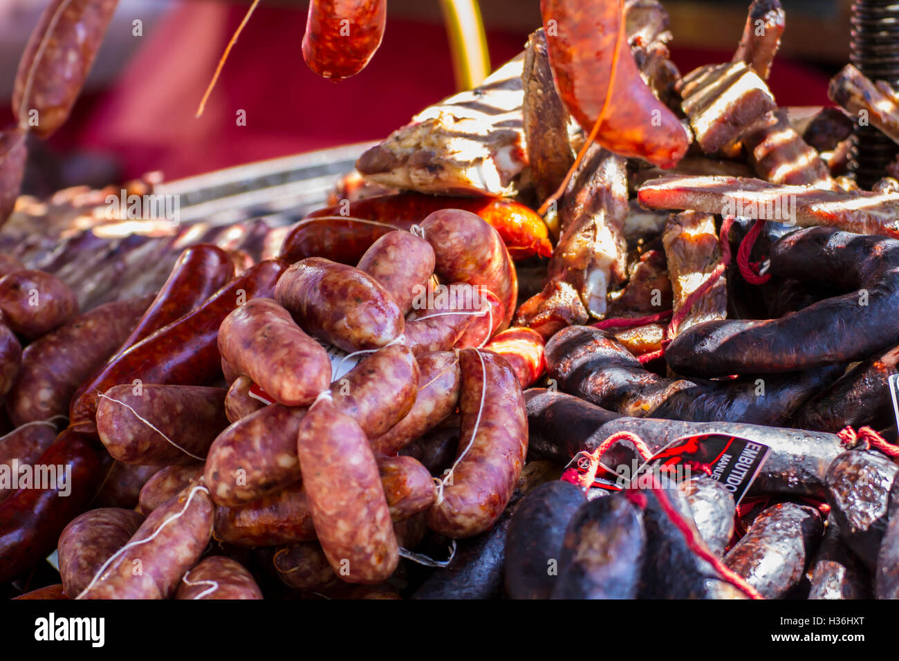 Cooked artisan sausages in a medieval fair Stock Photo - Alamy