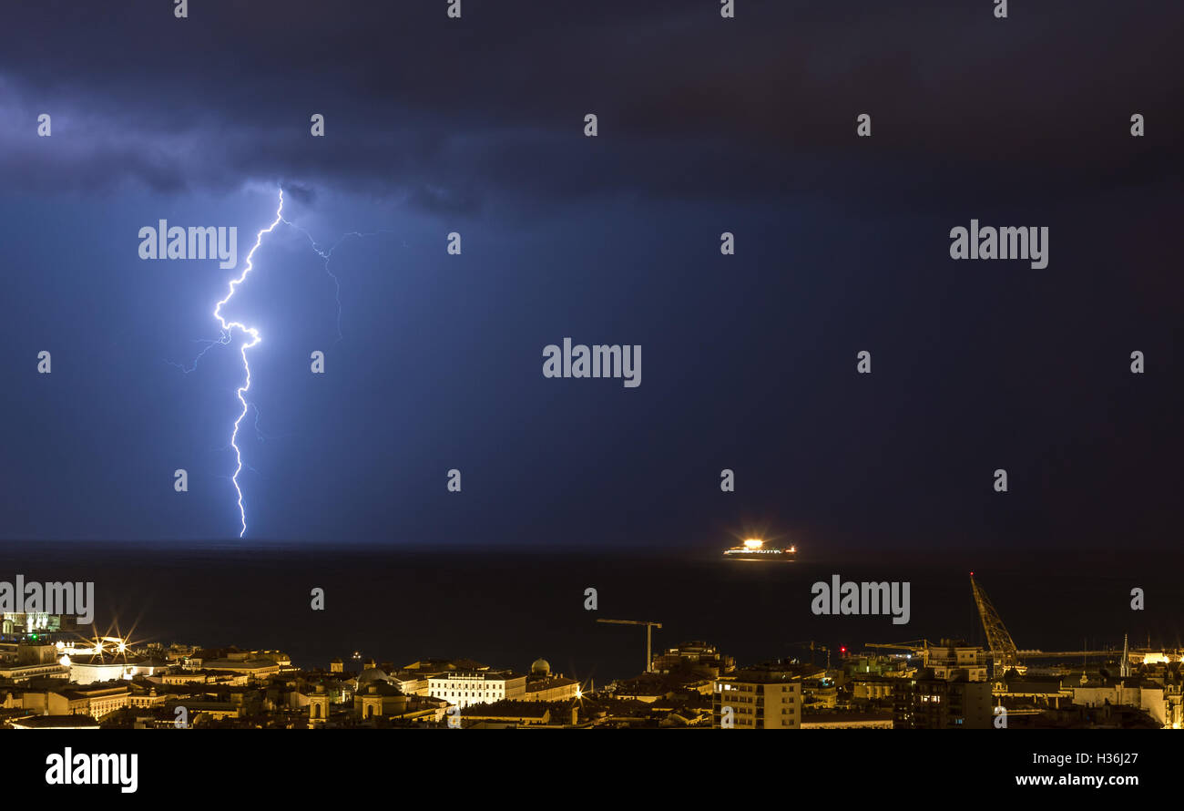 Massive cloud to ground lightning bolts hitting the horizon of city ...
