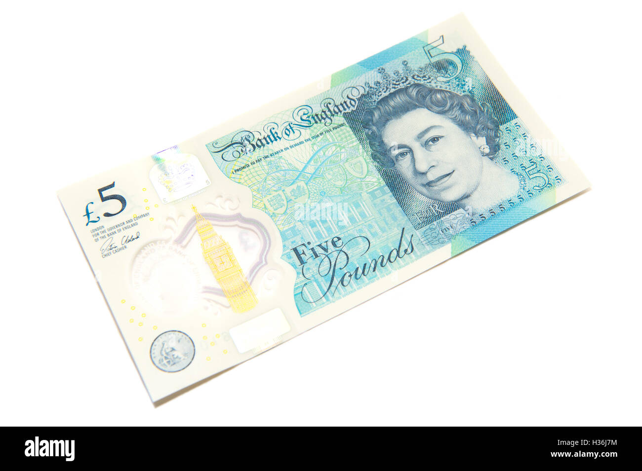 Front view of the new plastic (polymer) five pound note on a white ...
