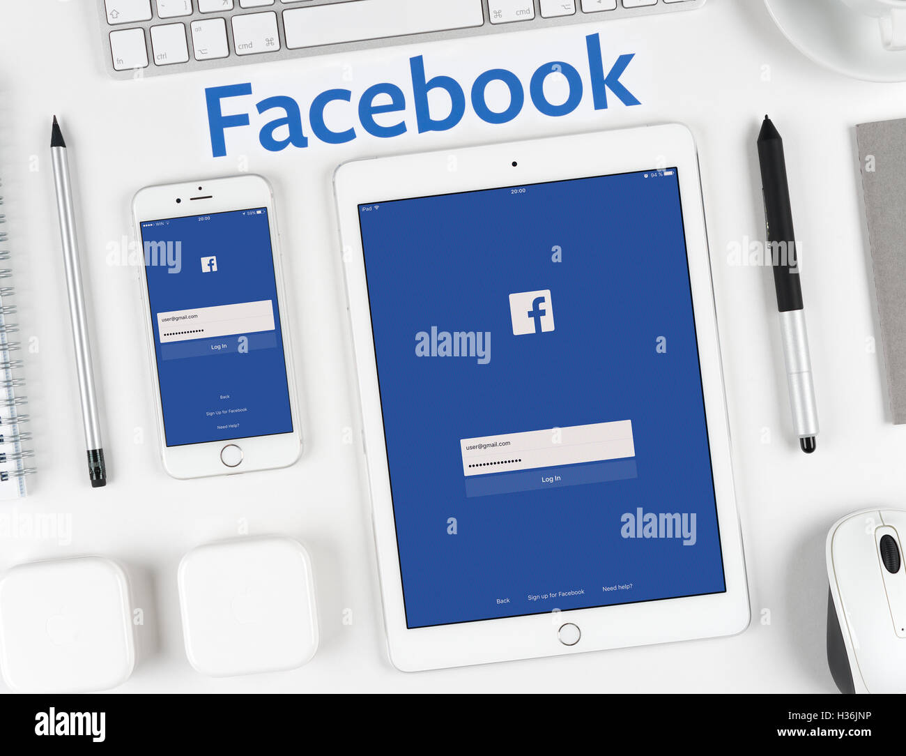 Facebook application on the iPhone and iPad display Stock Photo - Alamy