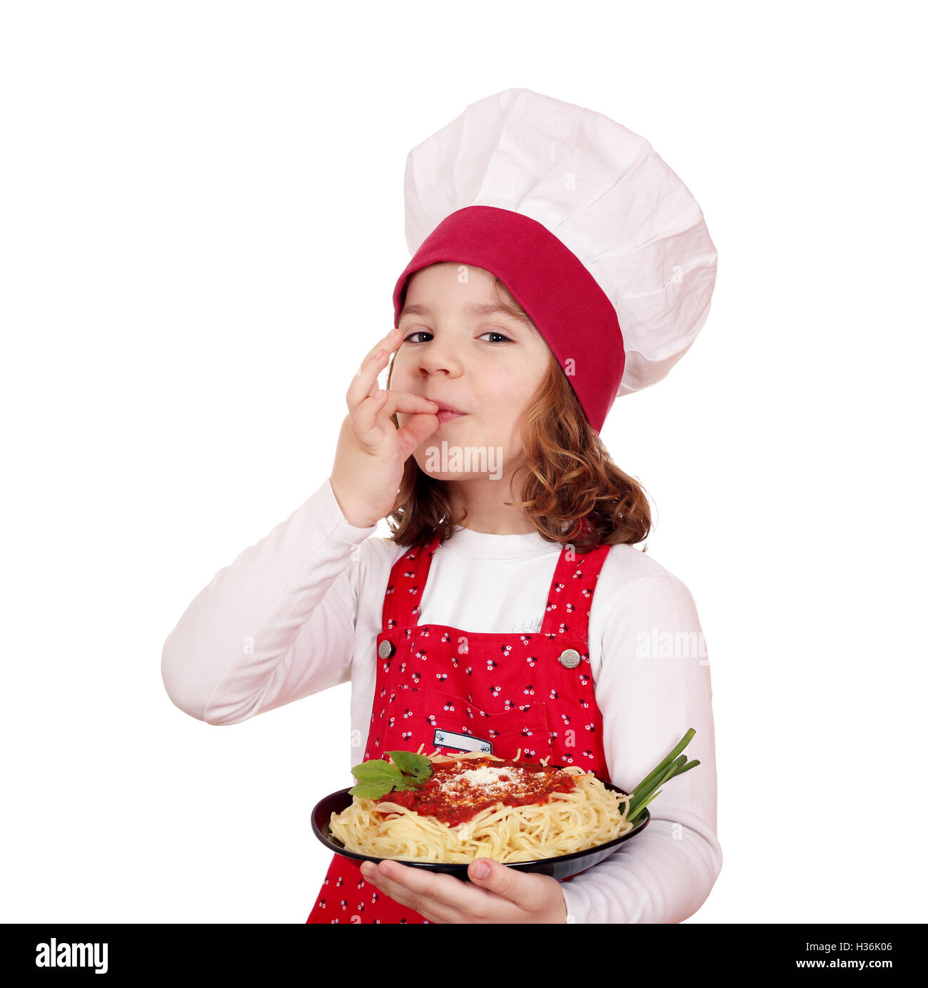 little girl cook holding a plate of spaghetti Stock Photo - Alamy