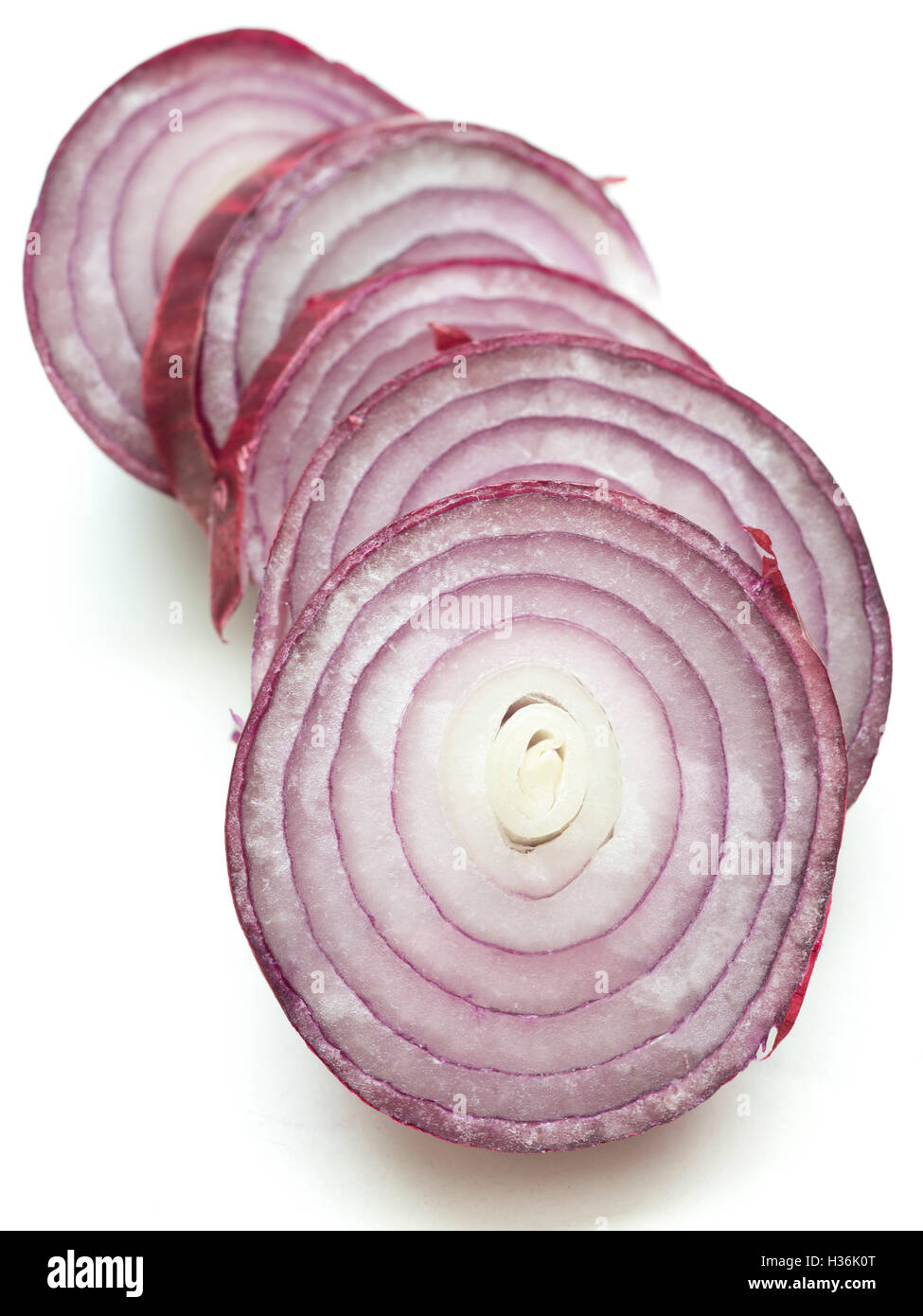 stack of fresh cut red onion slices isolated on white Stock Photo - Alamy
