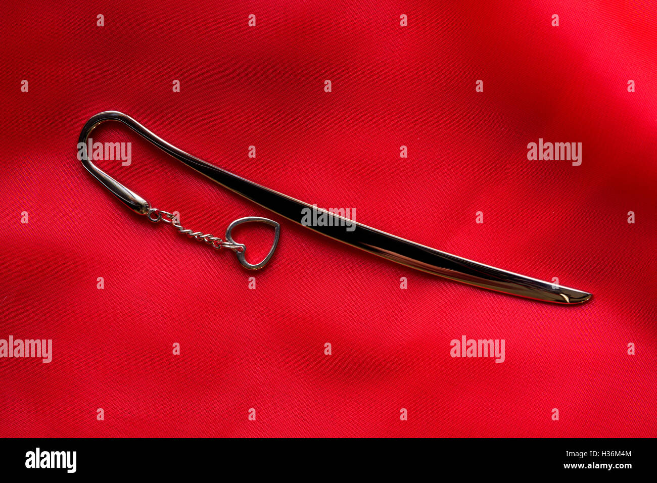 metal bookmark with heart symbol Stock Photo - Alamy