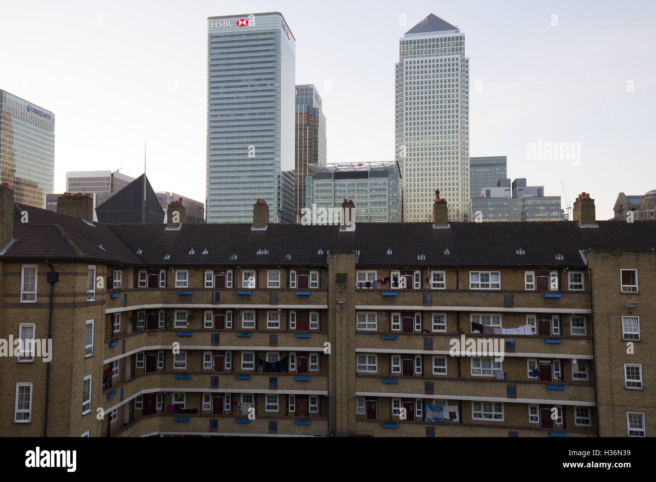 A Tower Hamlets estate is pictured with HSBC & No.1 Canada Square ...
