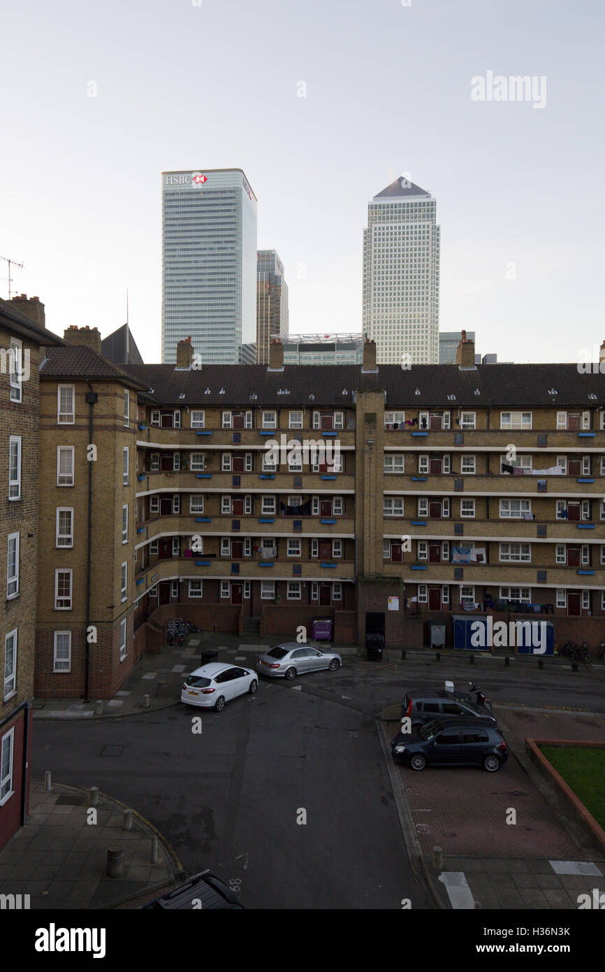 A Tower Hamlets estate is pictured with HSBC & No.1 Canada Square ...