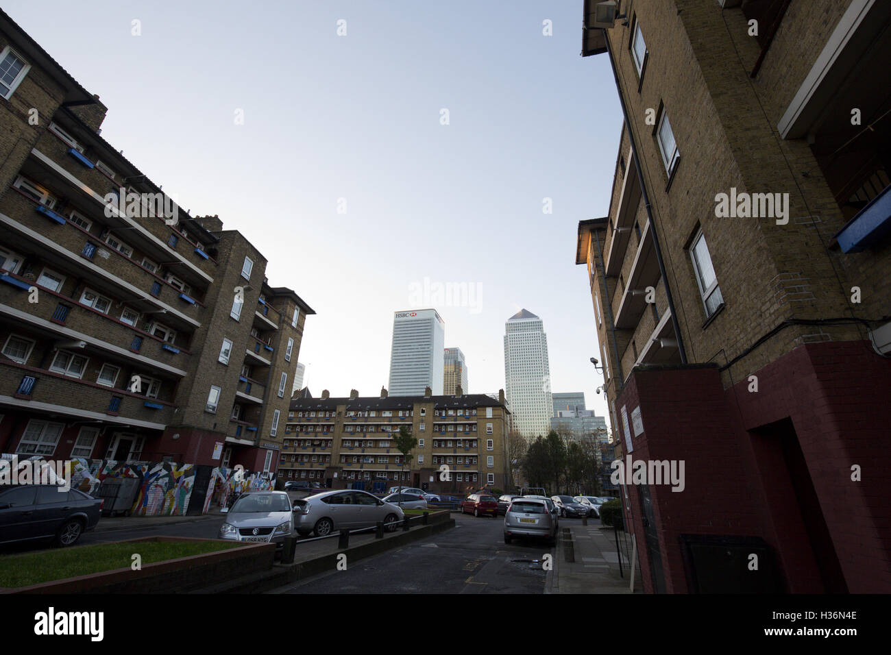 A Tower Hamlets estate is pictured with HSBC & No.1 Canada Square ...