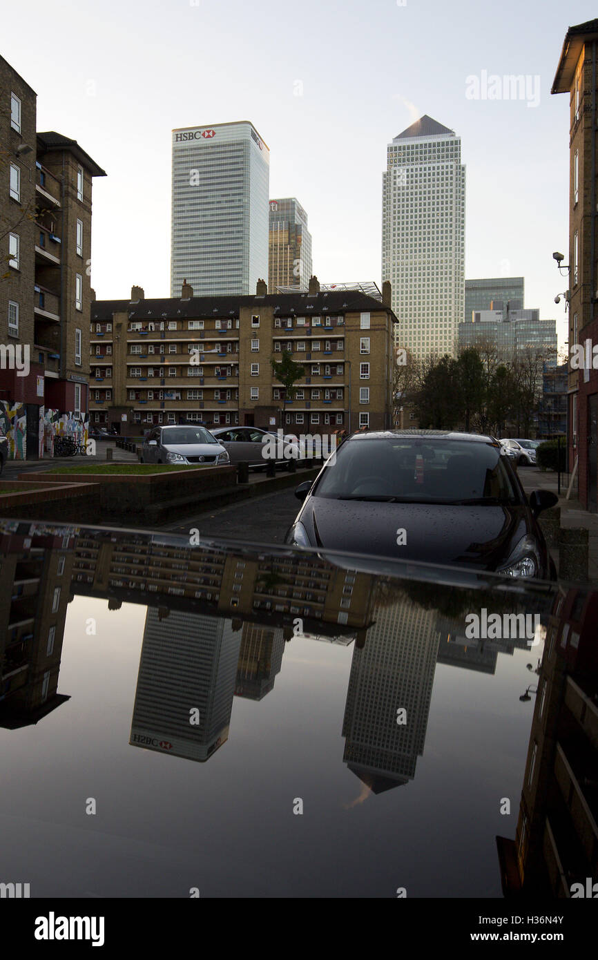 A Tower Hamlets estate is pictured with HSBC & No.1 Canada Square ...