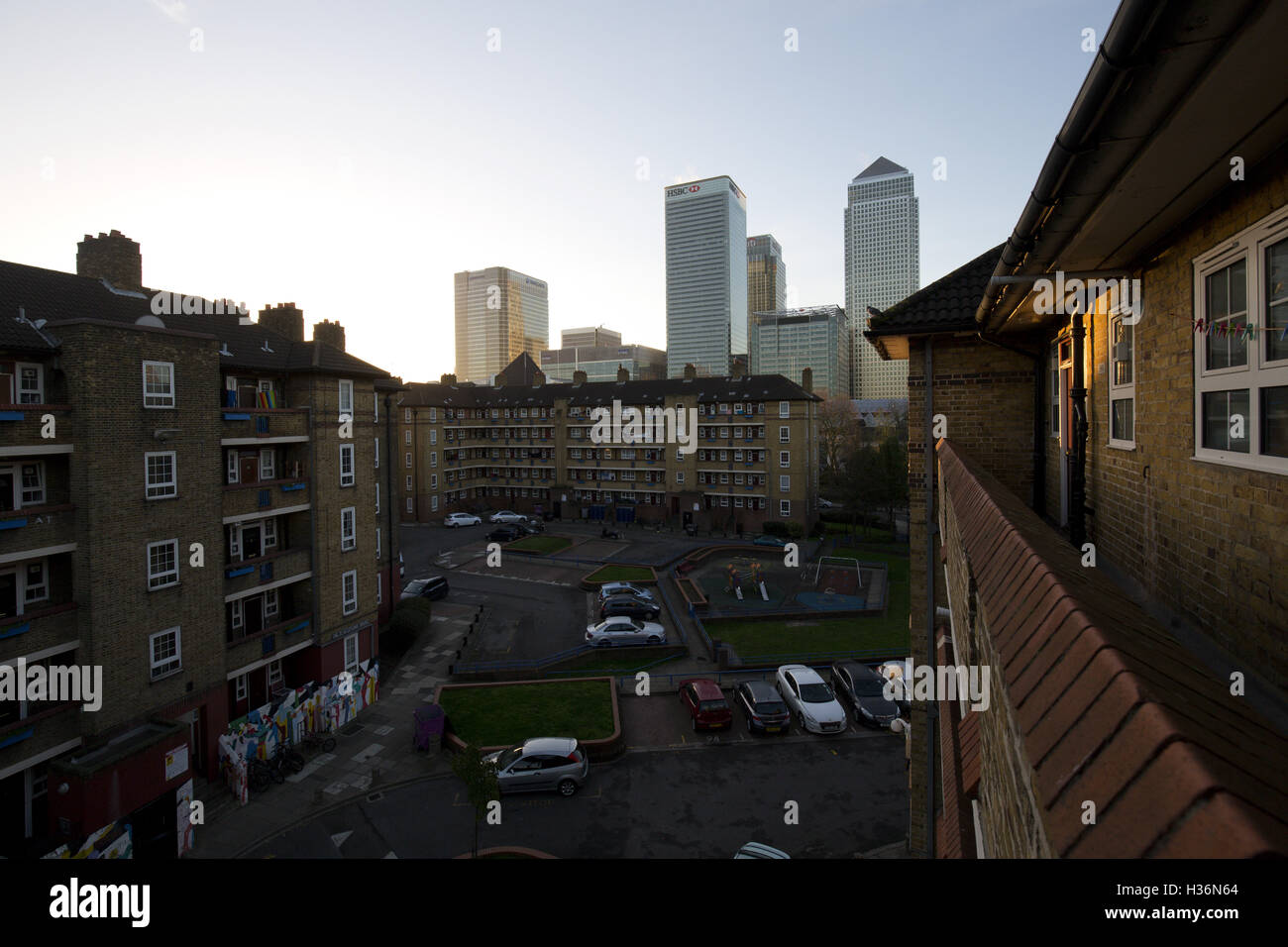 A Tower Hamlets estate is pictured with HSBC & No.1 Canada Square ...