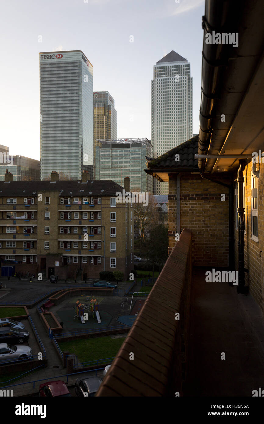 A Tower Hamlets estate is pictured with HSBC & No.1 Canada Square ...