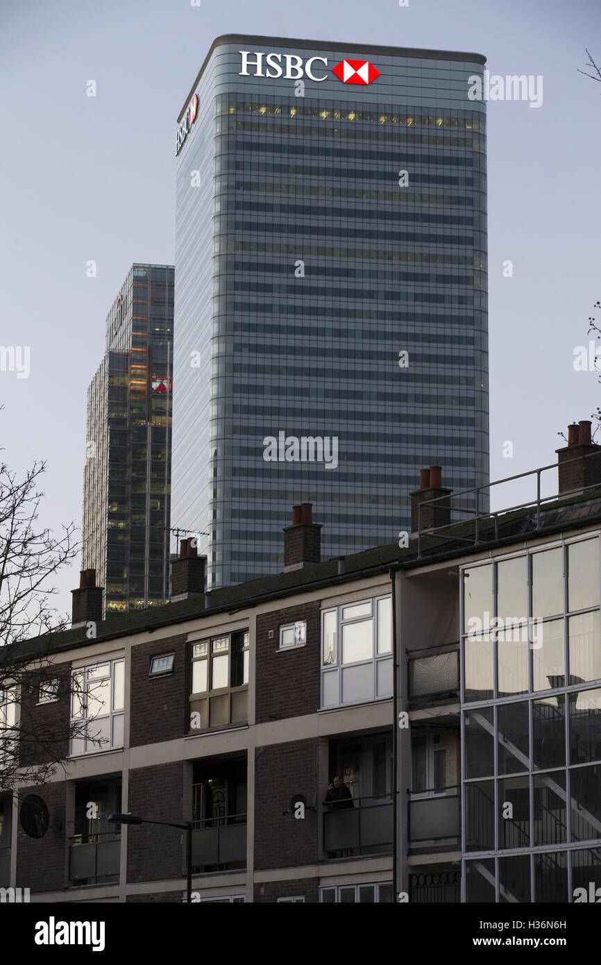 A Tower Hamlets estate is pictured with HSBC tower of Canary Wharf in ...