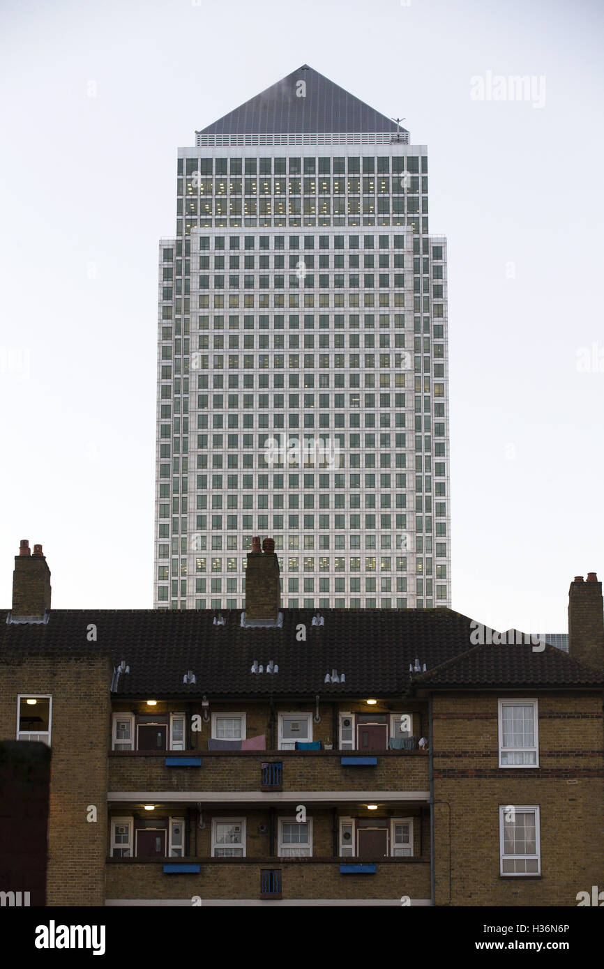 A housing estate in Tower Hamlets is pictured with No.1 Canada Square ...