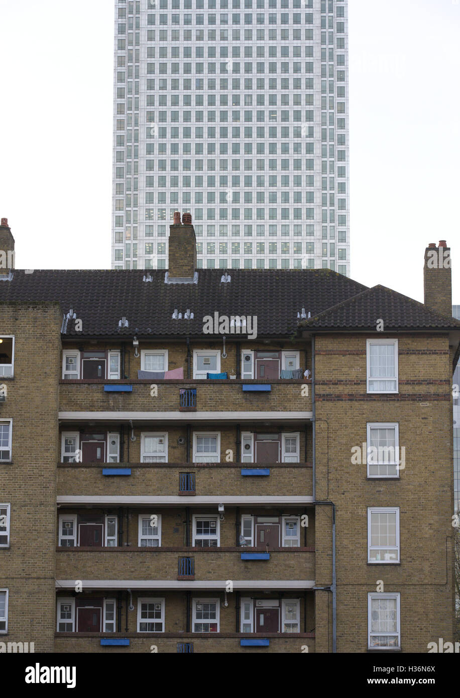 A housing estate in Tower Hamlets is pictured with No.1 Canada Square ...