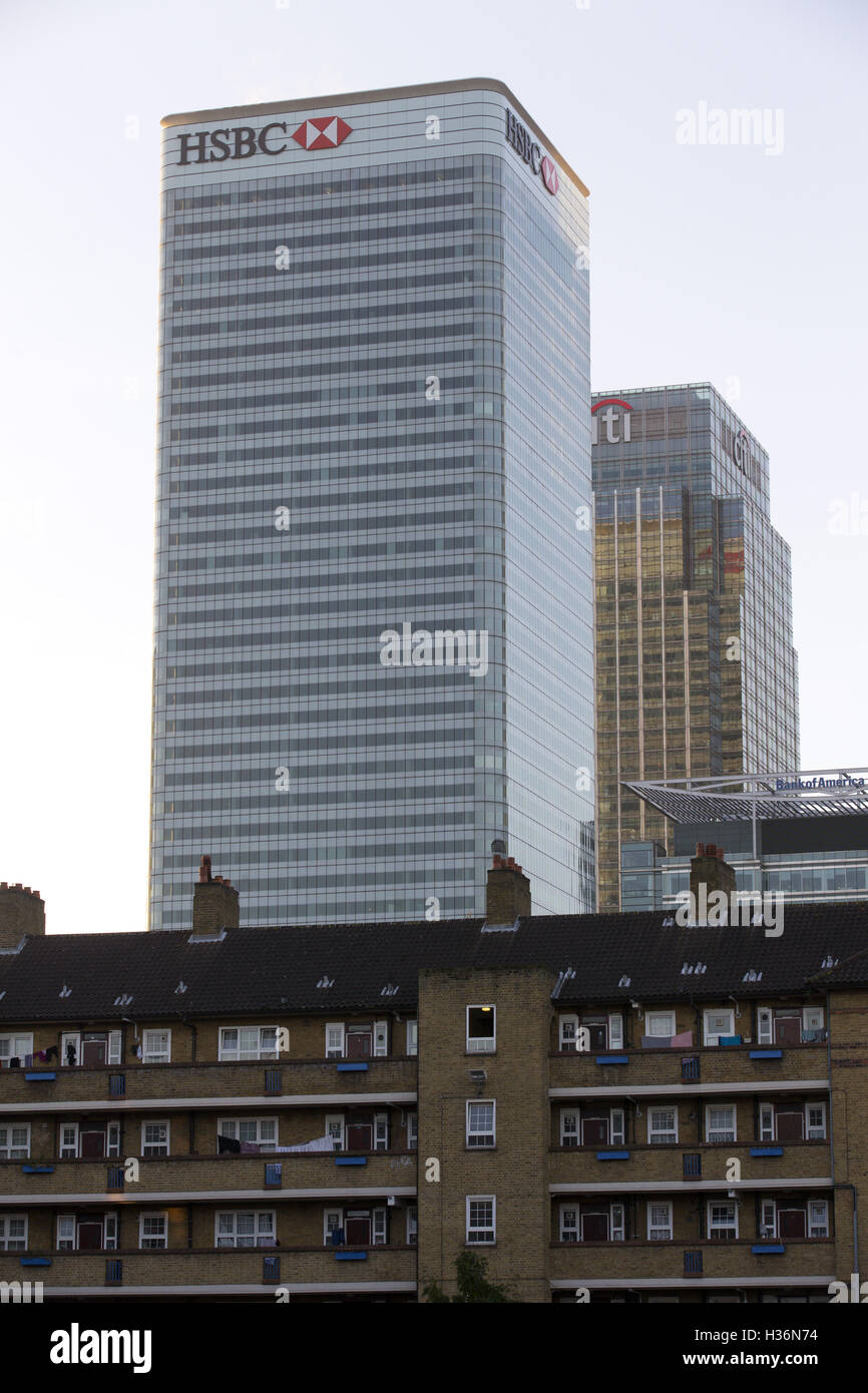 A Tower Hamlets estate is pictured with HSBC tower of Canary Wharf in ...