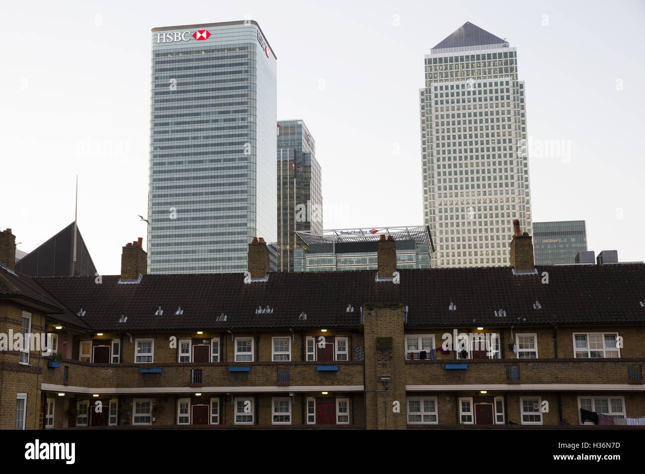 A Tower Hamlets estate is pictured with HSBC & No.1 Canada Square ...