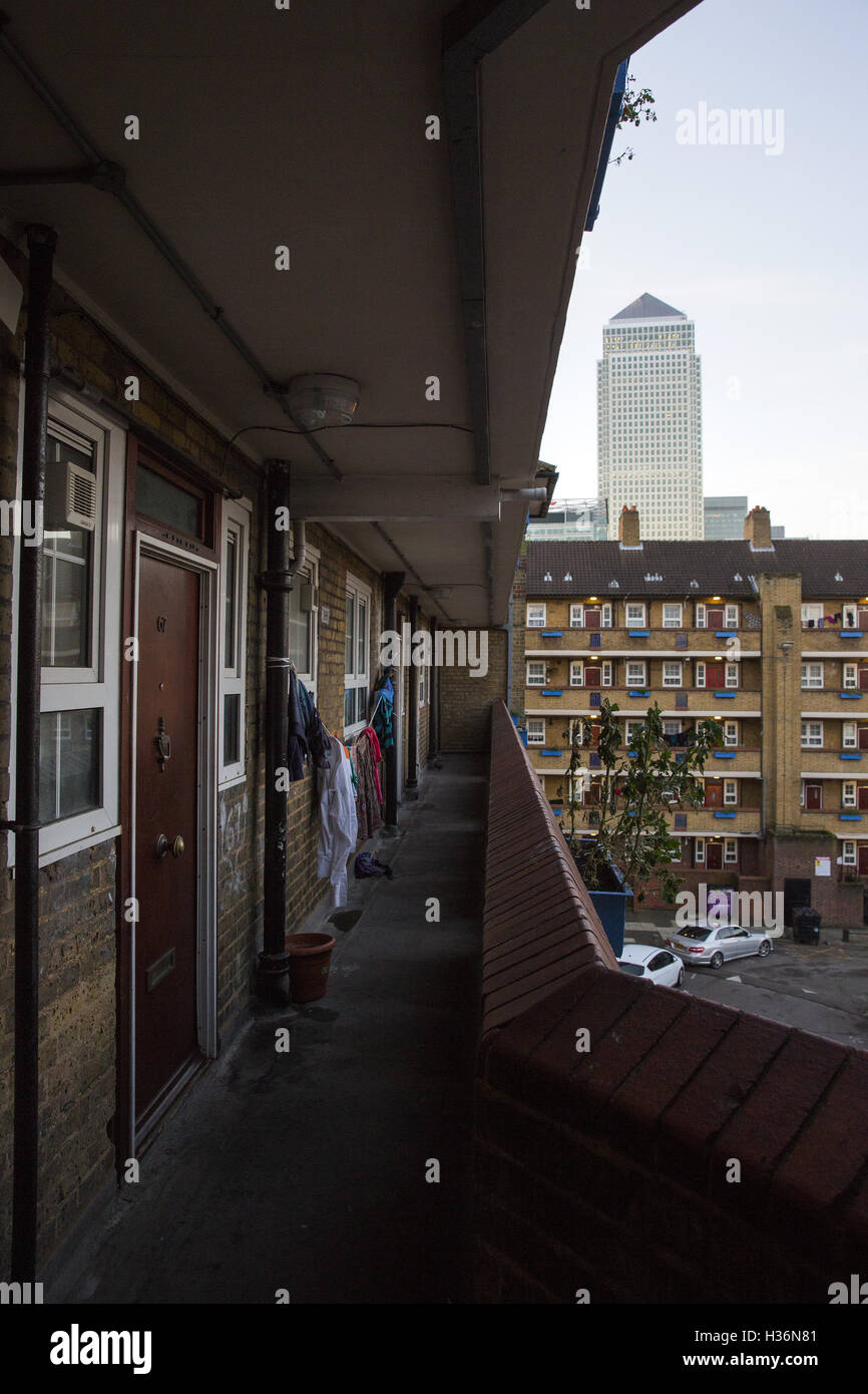 A Tower Hamlets estate is pictured with HSBC & No.1 Canada Square ...
