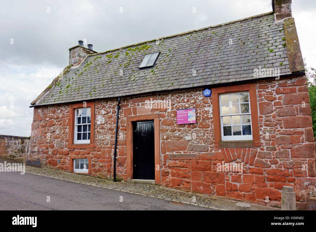 Old Bridge House Museum in Dumfries, Scotland. House built in 1660 into ...