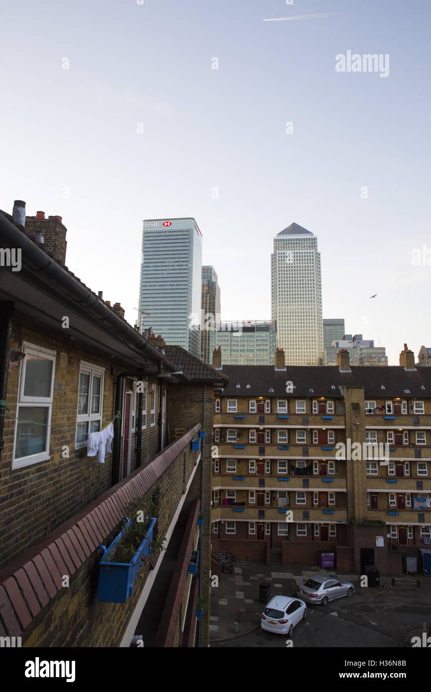 A Tower Hamlets estate is pictured with HSBC & No.1 Canada Square ...
