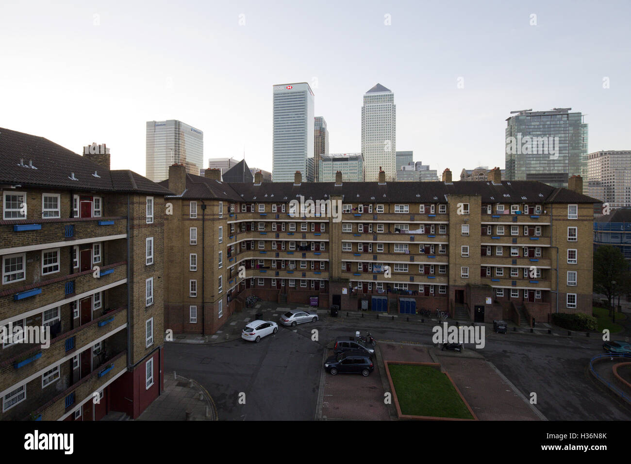 A Tower Hamlets estate is pictured with HSBC & No.1 Canada Square ...