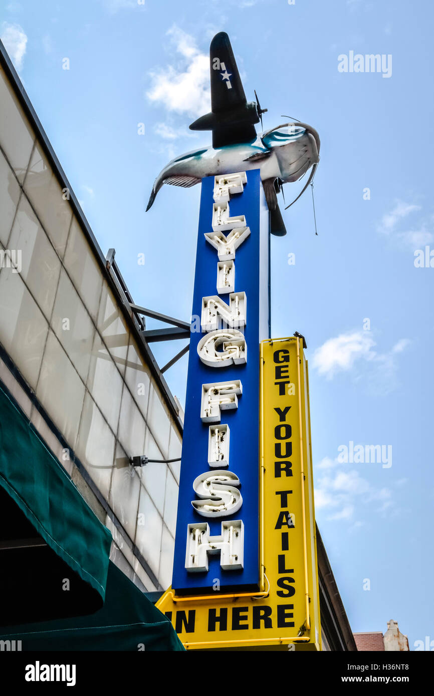 The Flying Fish Restaurant's big blue overhead neon sign in front of ...