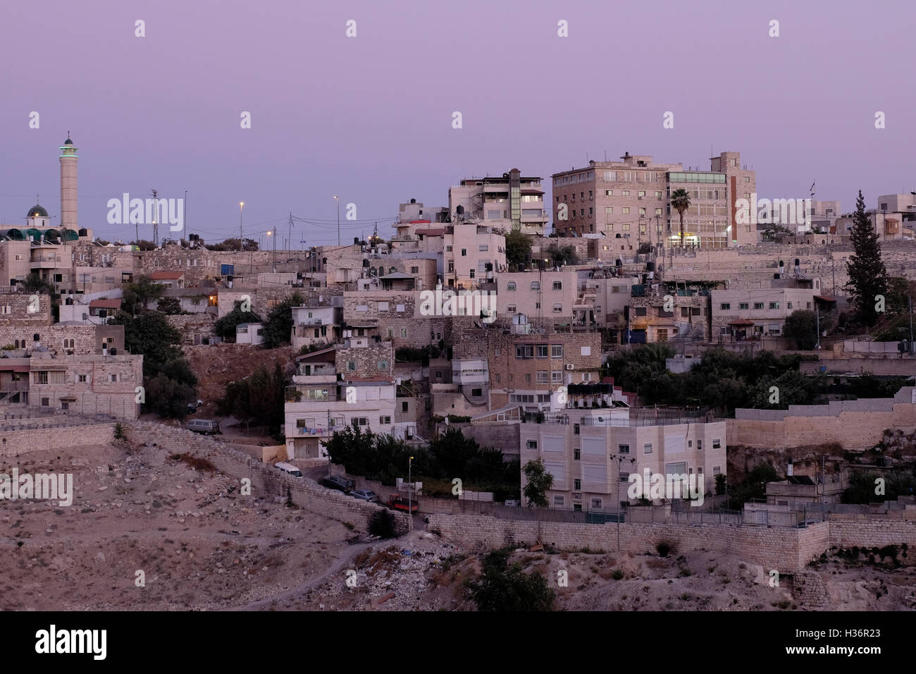 View at twilight of Ras al-Amud a Palestinian neighborhood located ...