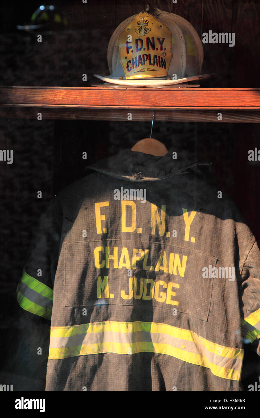 F.D.N.Y's chaplain Mychal Judge's fire helmet and coat display in New ...