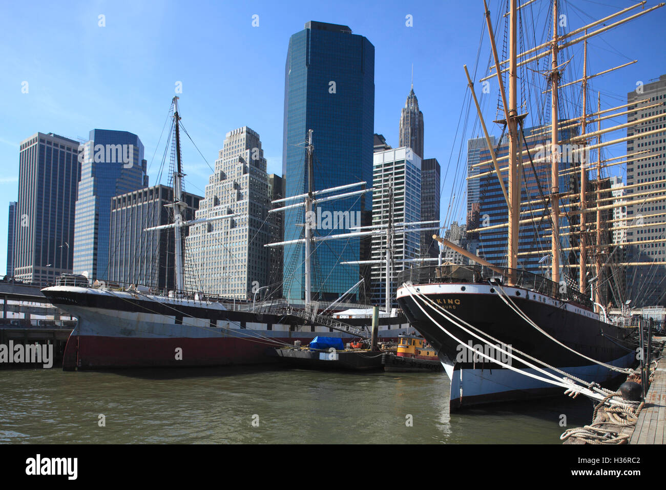 Peking a four-masted barque docking in the Pier 17 with office towers ...