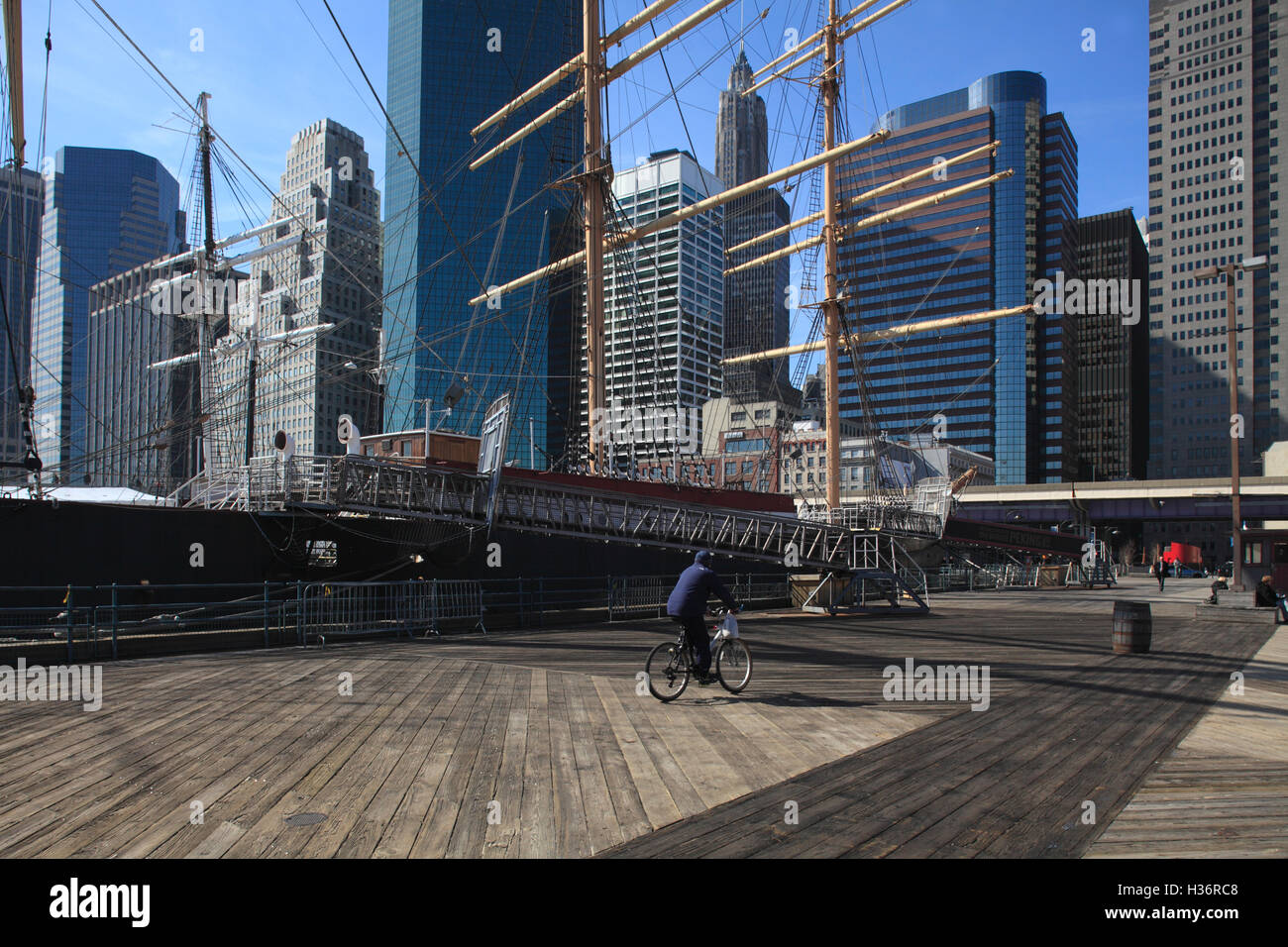 The view of South Street Seaport with the high-rise office towers of ...
