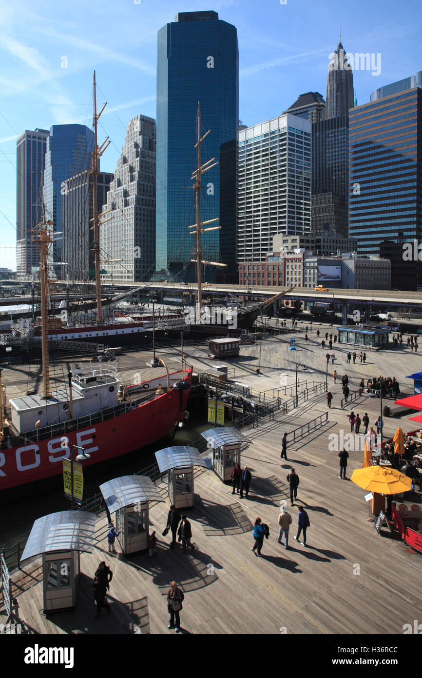 The view of South Street Seaport with the high-rise office towers of ...