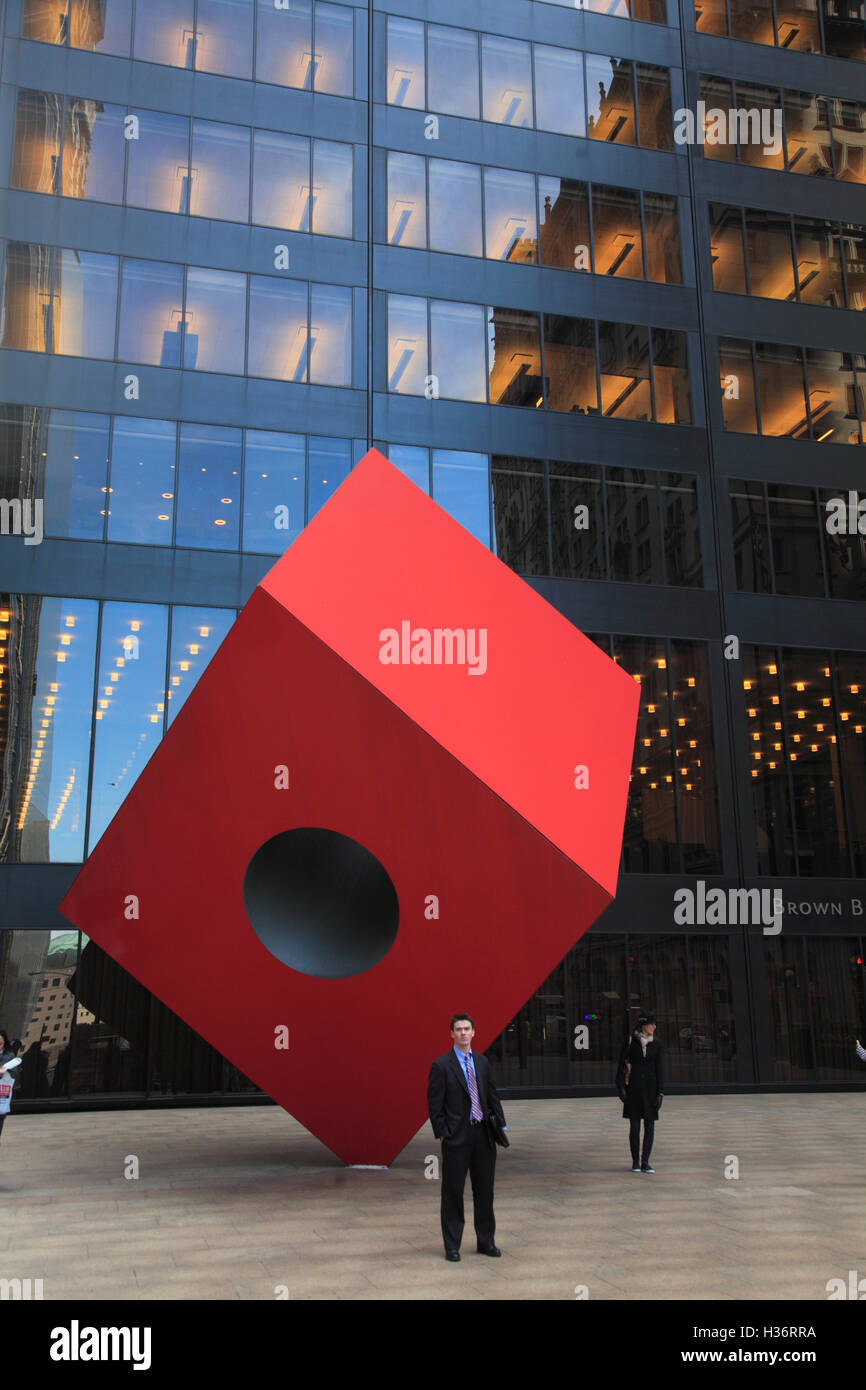 People in front of the Red Cube,a steel sculpture by Isamu Noguchi in ...