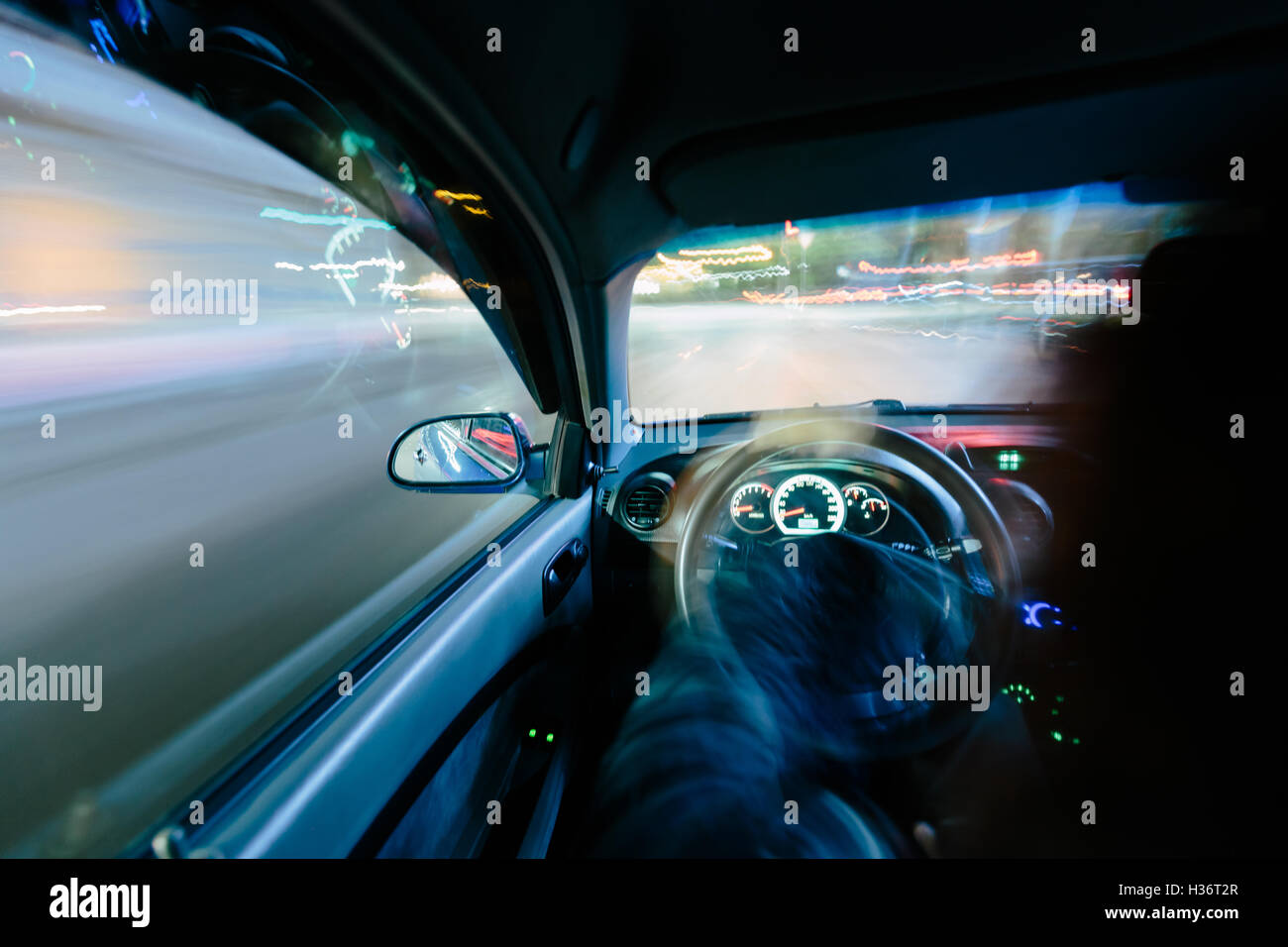 Driving at night Stock Photo - Alamy