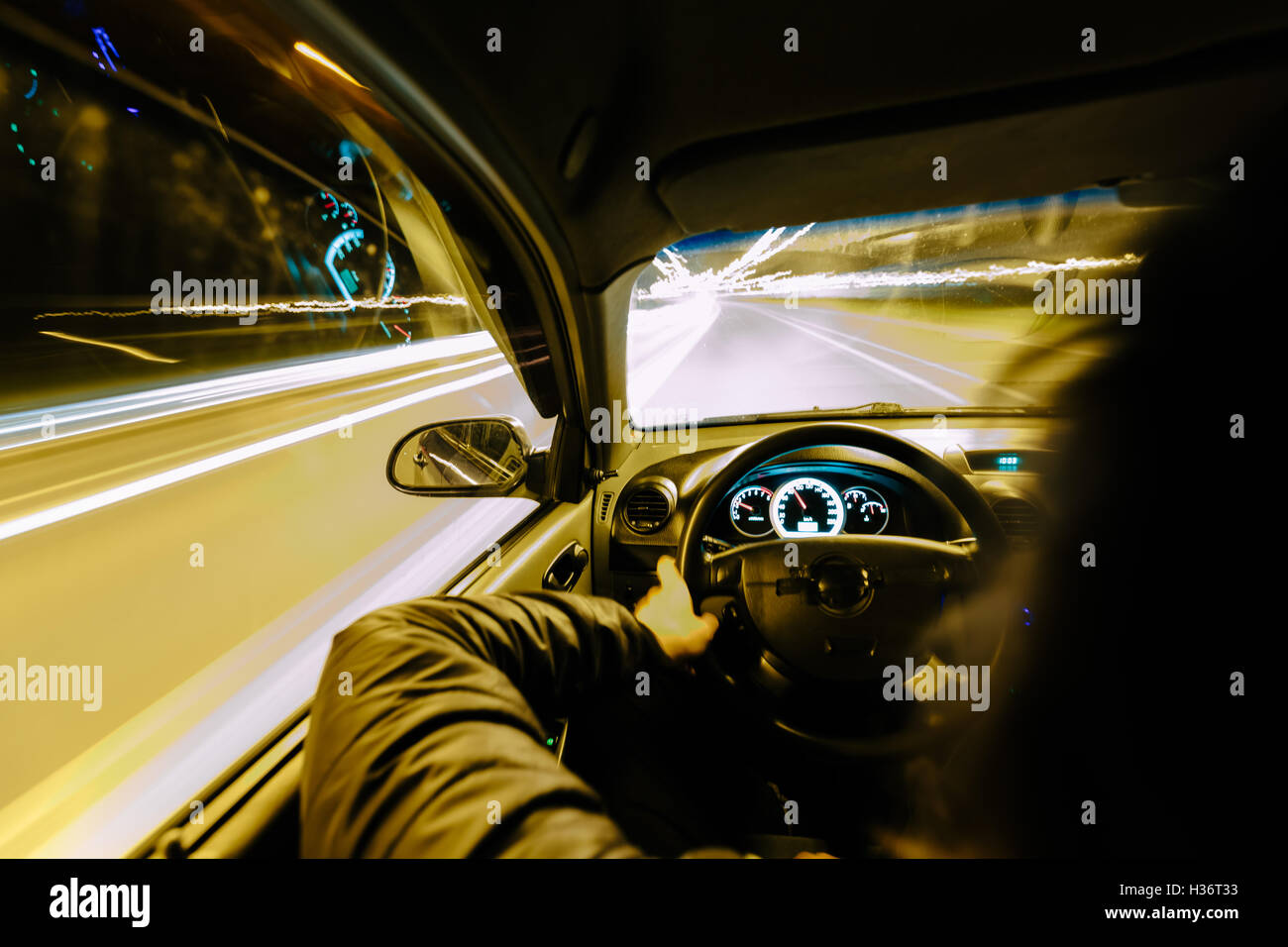 Driving at night Stock Photo - Alamy