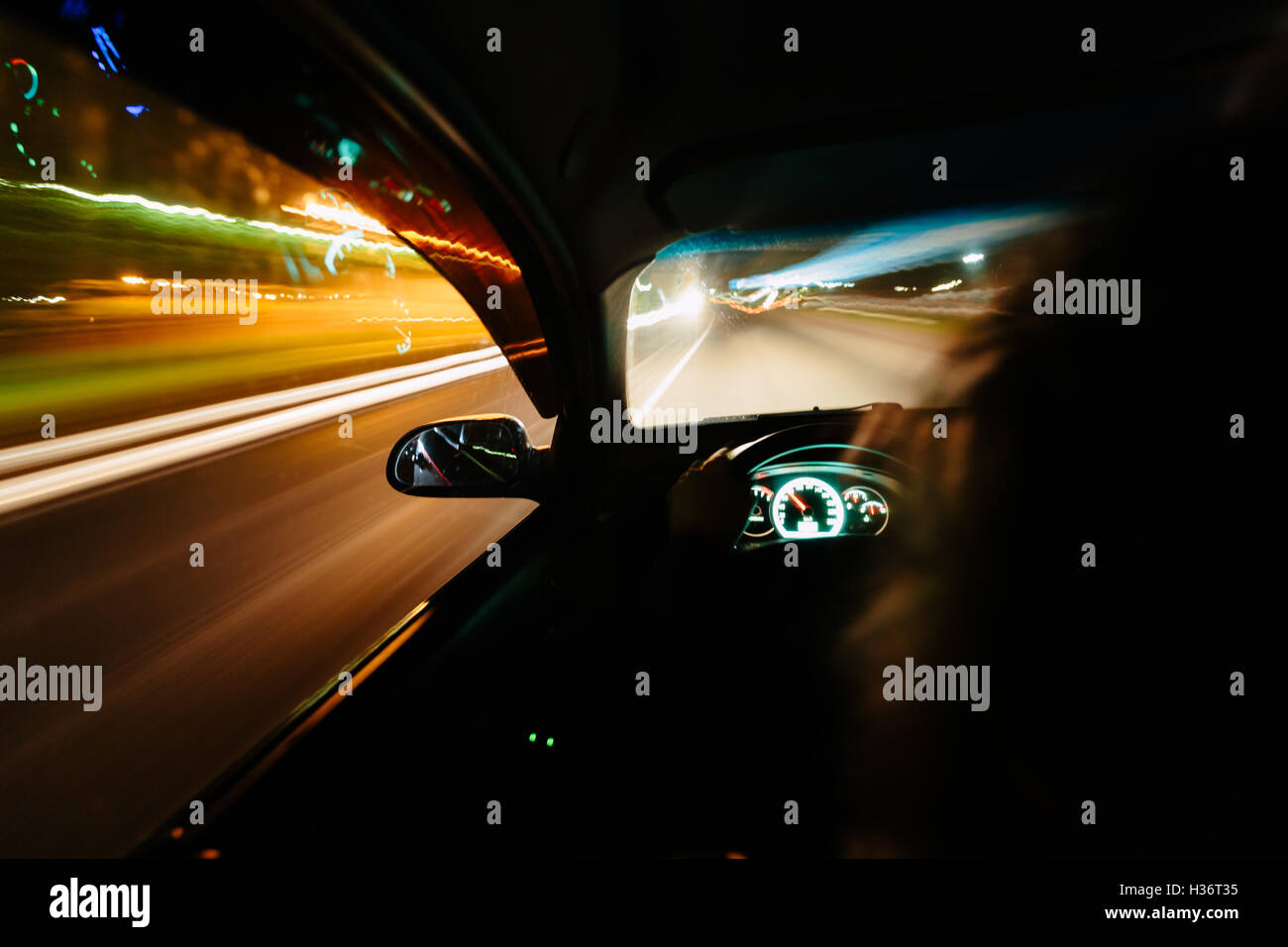 Driving at night Stock Photo - Alamy