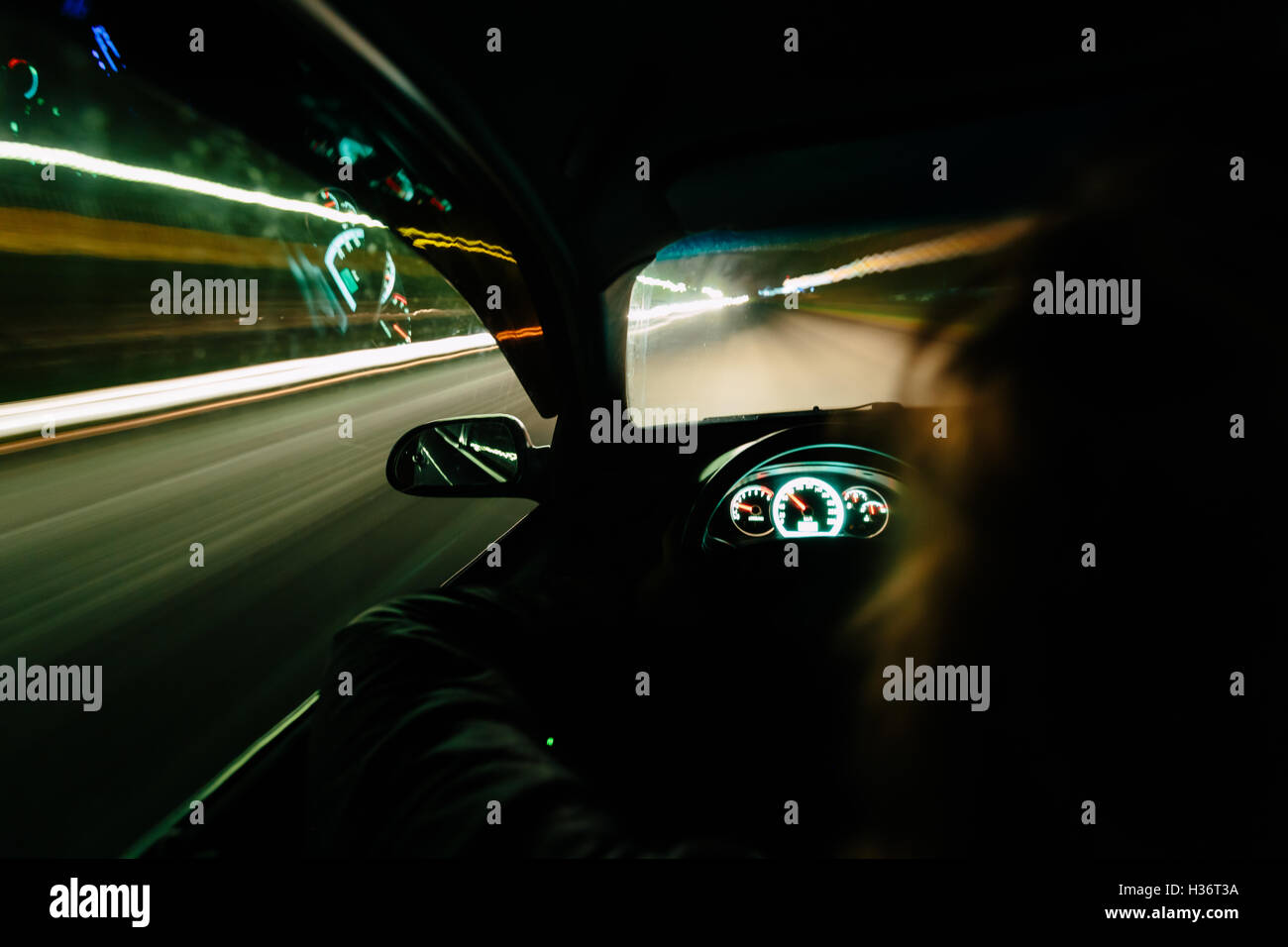 Driving at night Stock Photo - Alamy