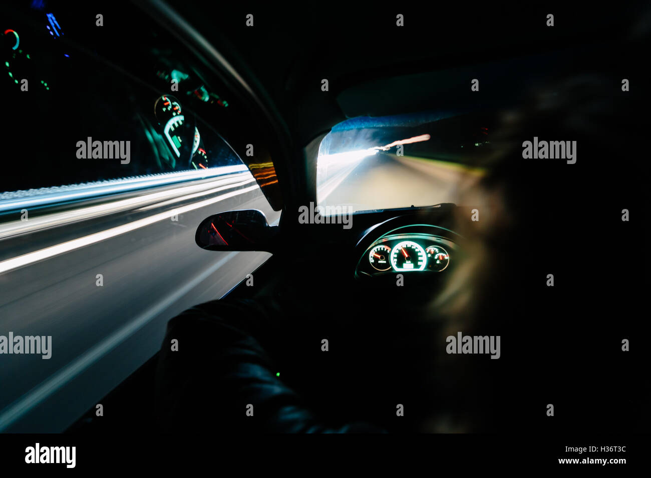 Driving at night Stock Photo - Alamy