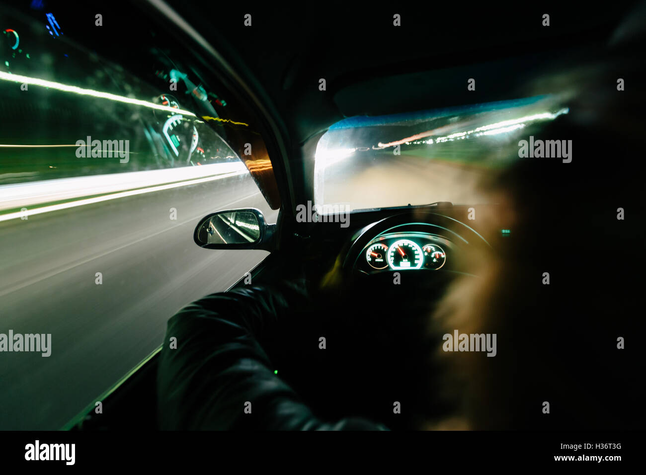 Driving at night Stock Photo - Alamy