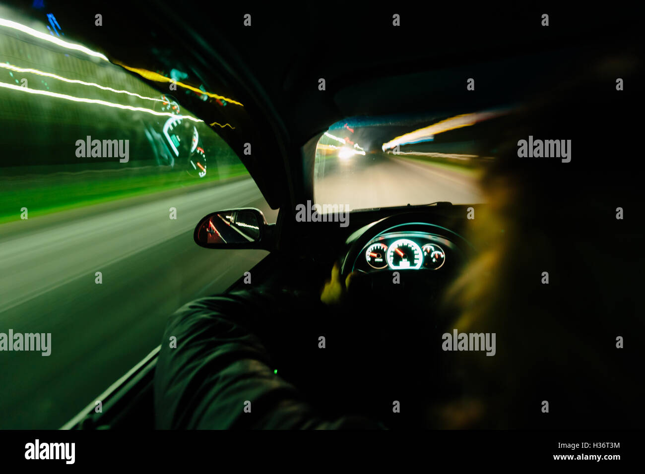 Driving at night Stock Photo - Alamy