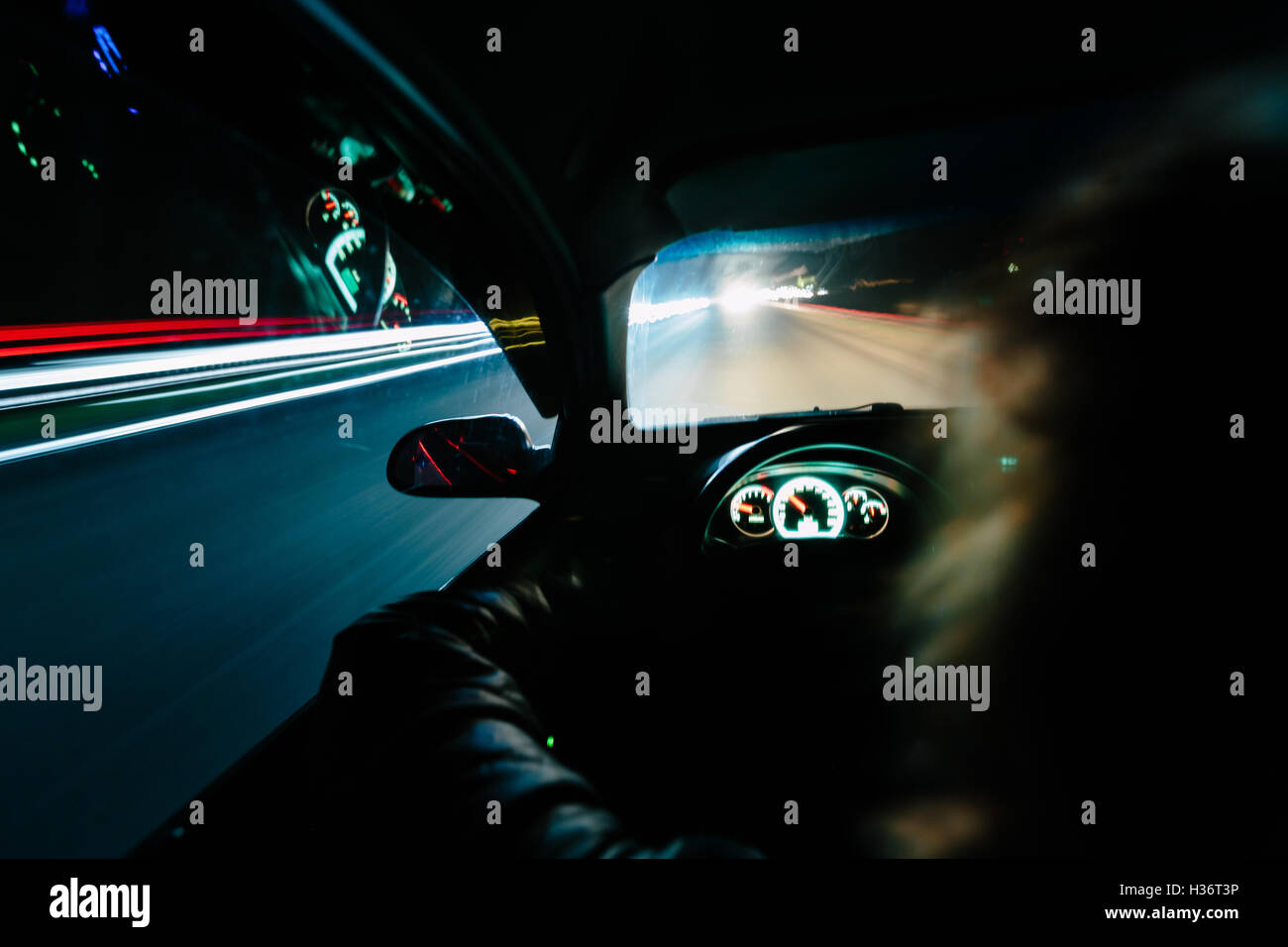 Driving at night Stock Photo - Alamy