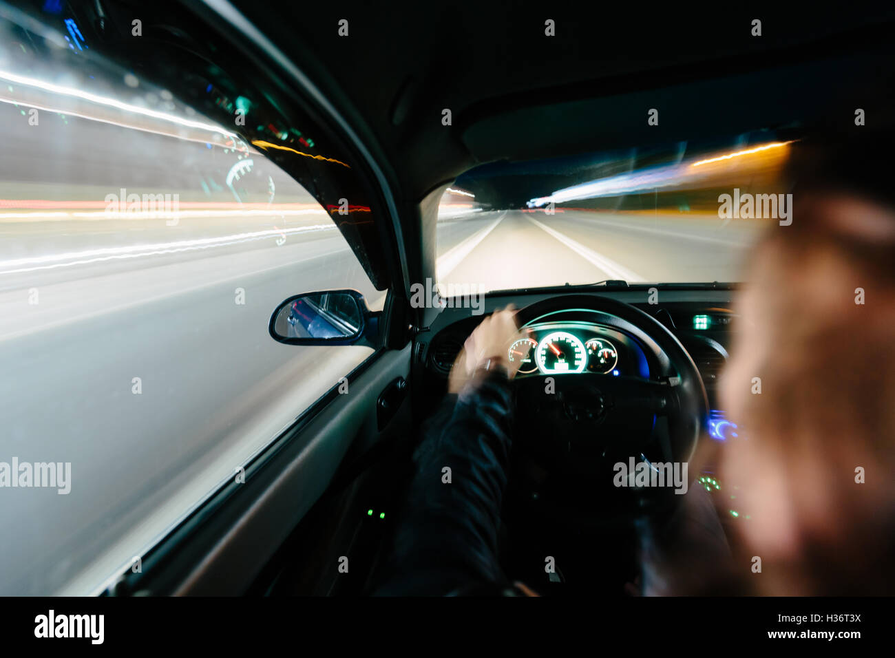 Driving at night Stock Photo - Alamy