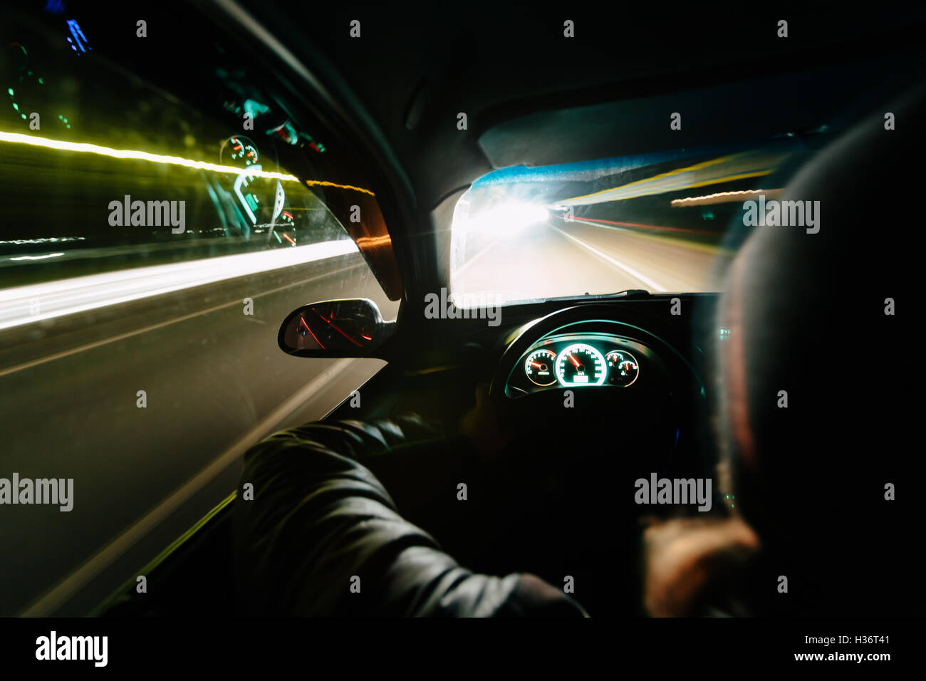 Driving at night Stock Photo - Alamy