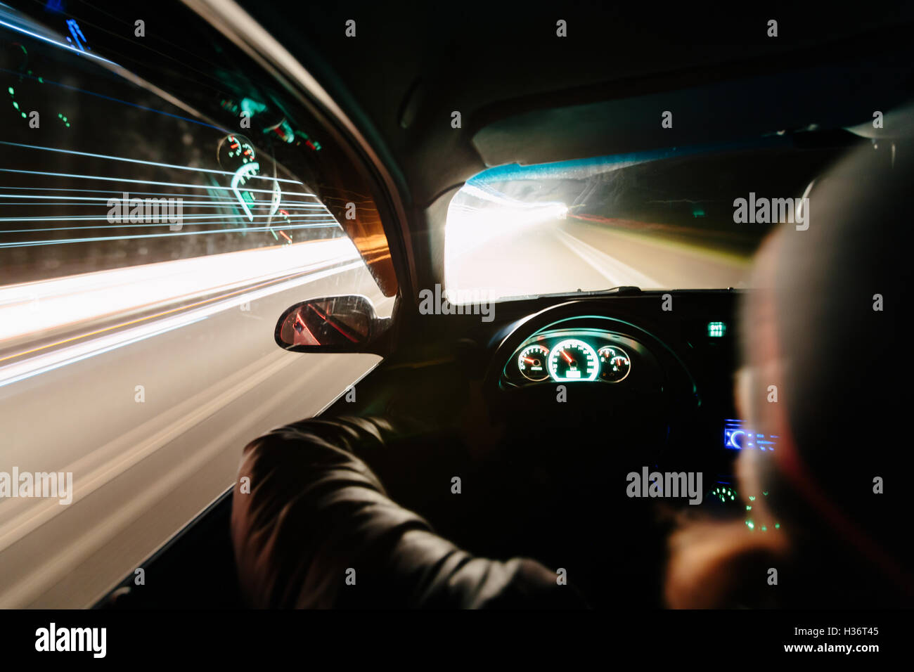 Driving at night Stock Photo - Alamy