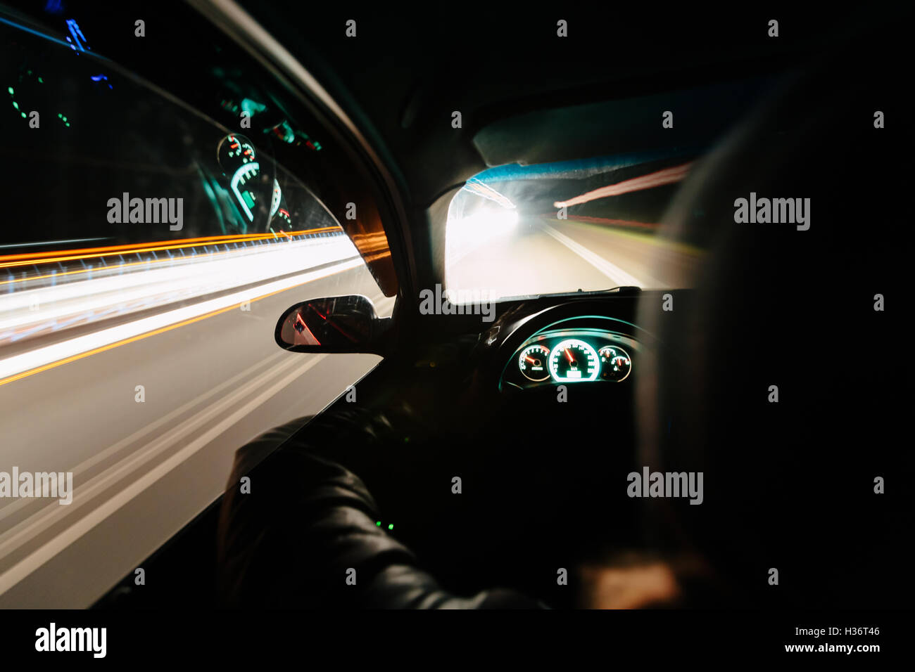 Driving at night Stock Photo - Alamy