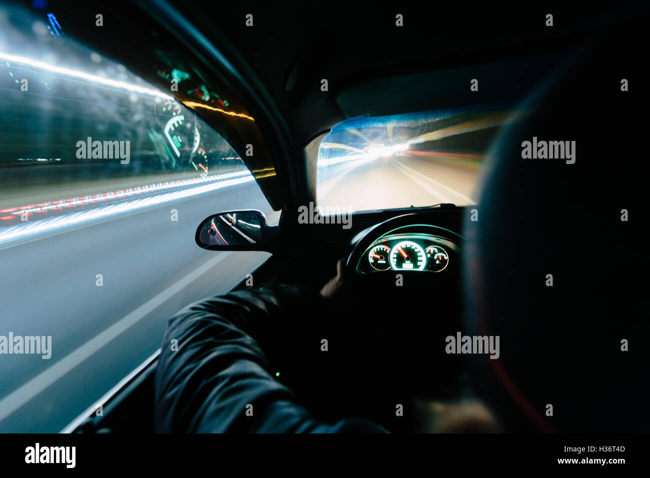 Driving at night Stock Photo - Alamy