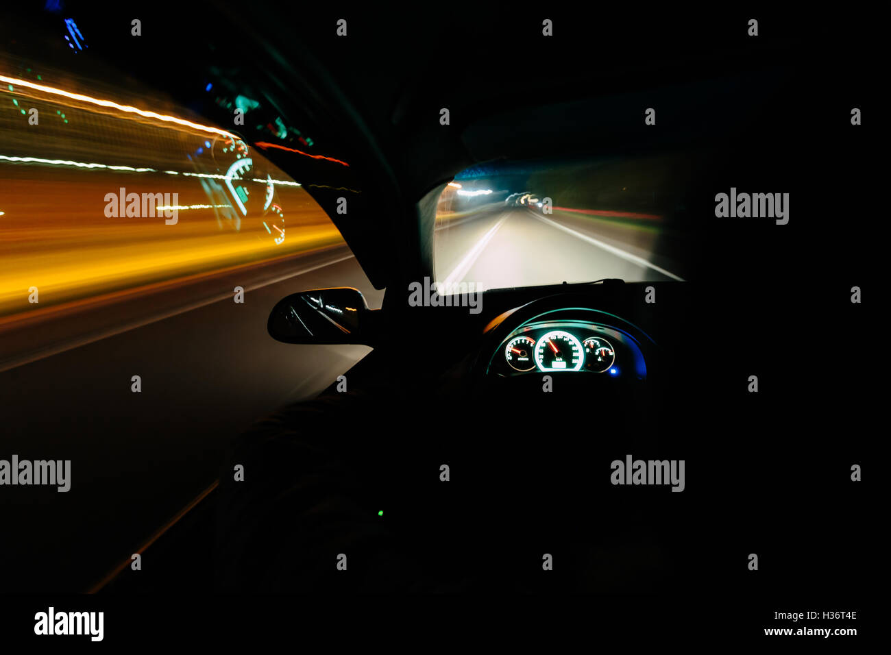 Driving at night Stock Photo - Alamy