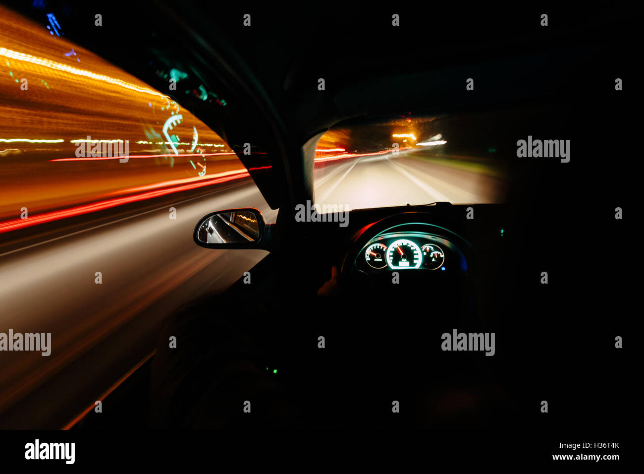 Driving at night Stock Photo - Alamy