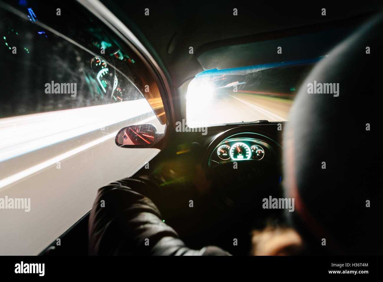 Driving at night Stock Photo - Alamy