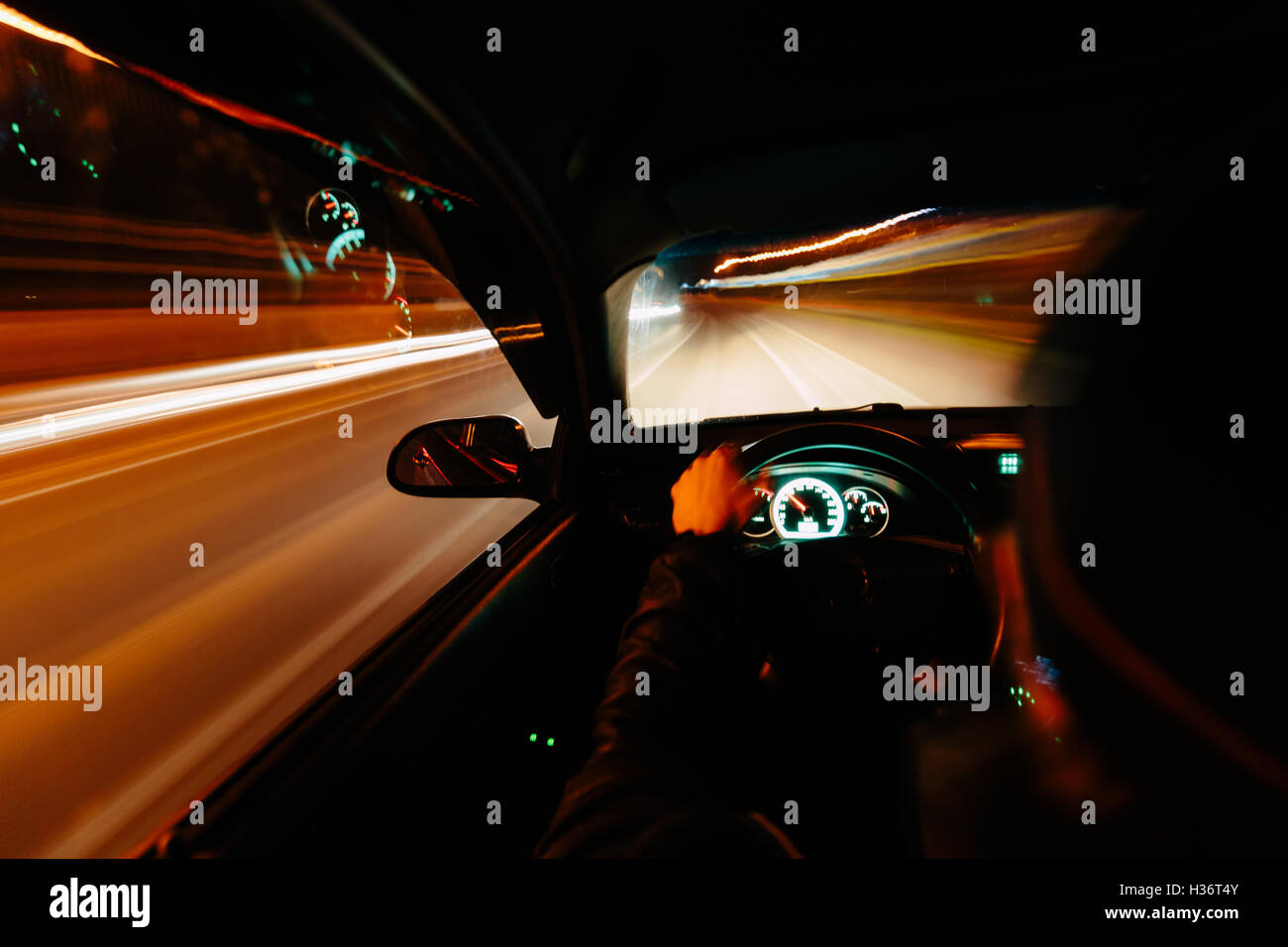 Driving at night Stock Photo - Alamy