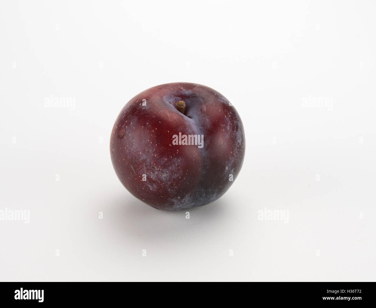 Plum isolated on white background Stock Photo - Alamy