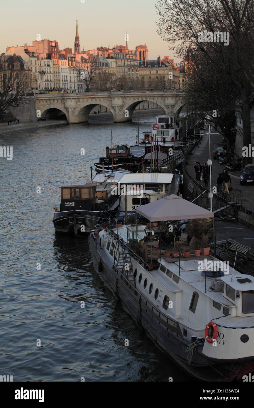 The sunset on River Seine with Ile de la Cite (Cite Island ) in the ...