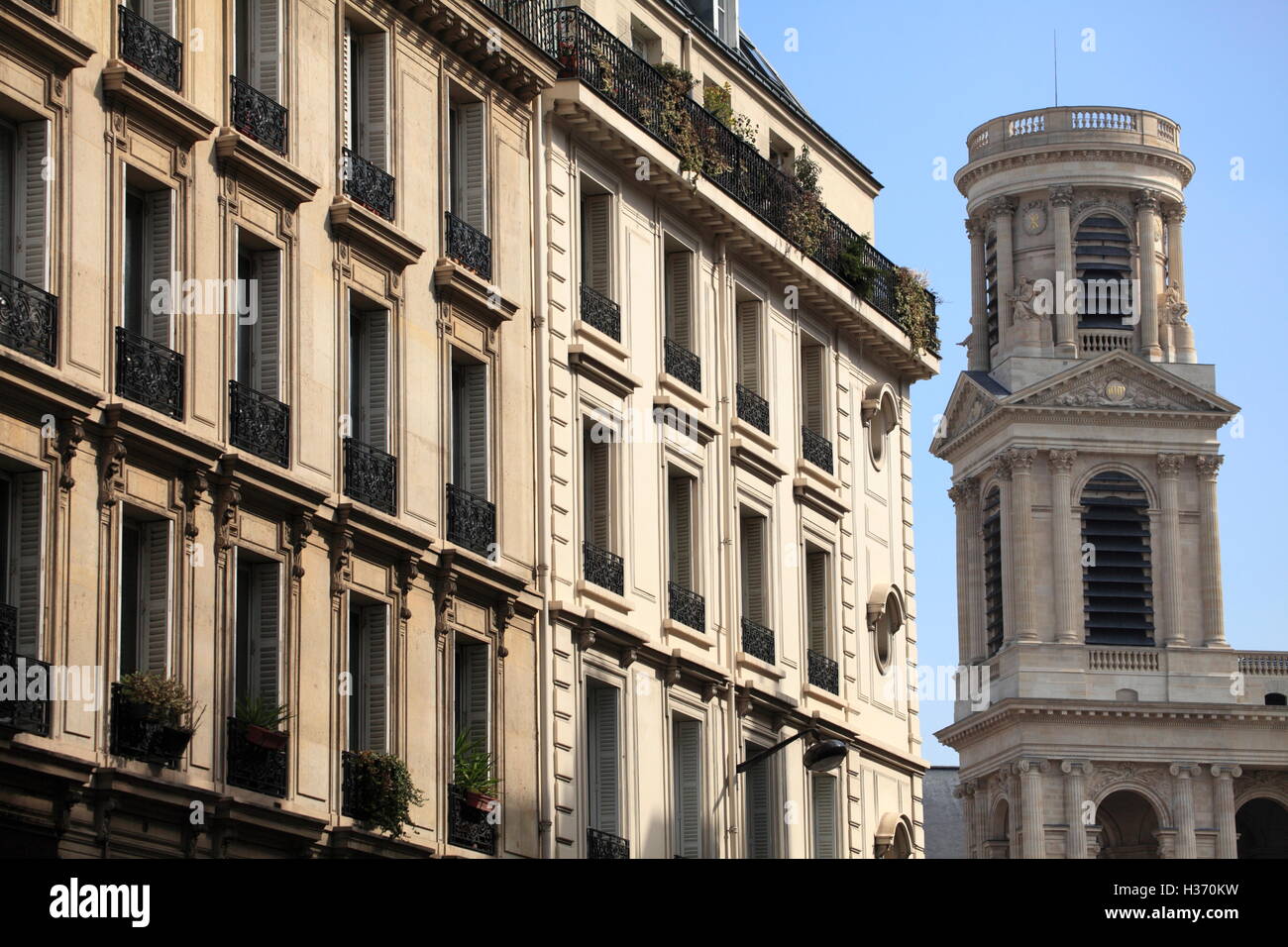 Apartment buildings with the bell tower of Eglise Saint-Sulpice (St ...