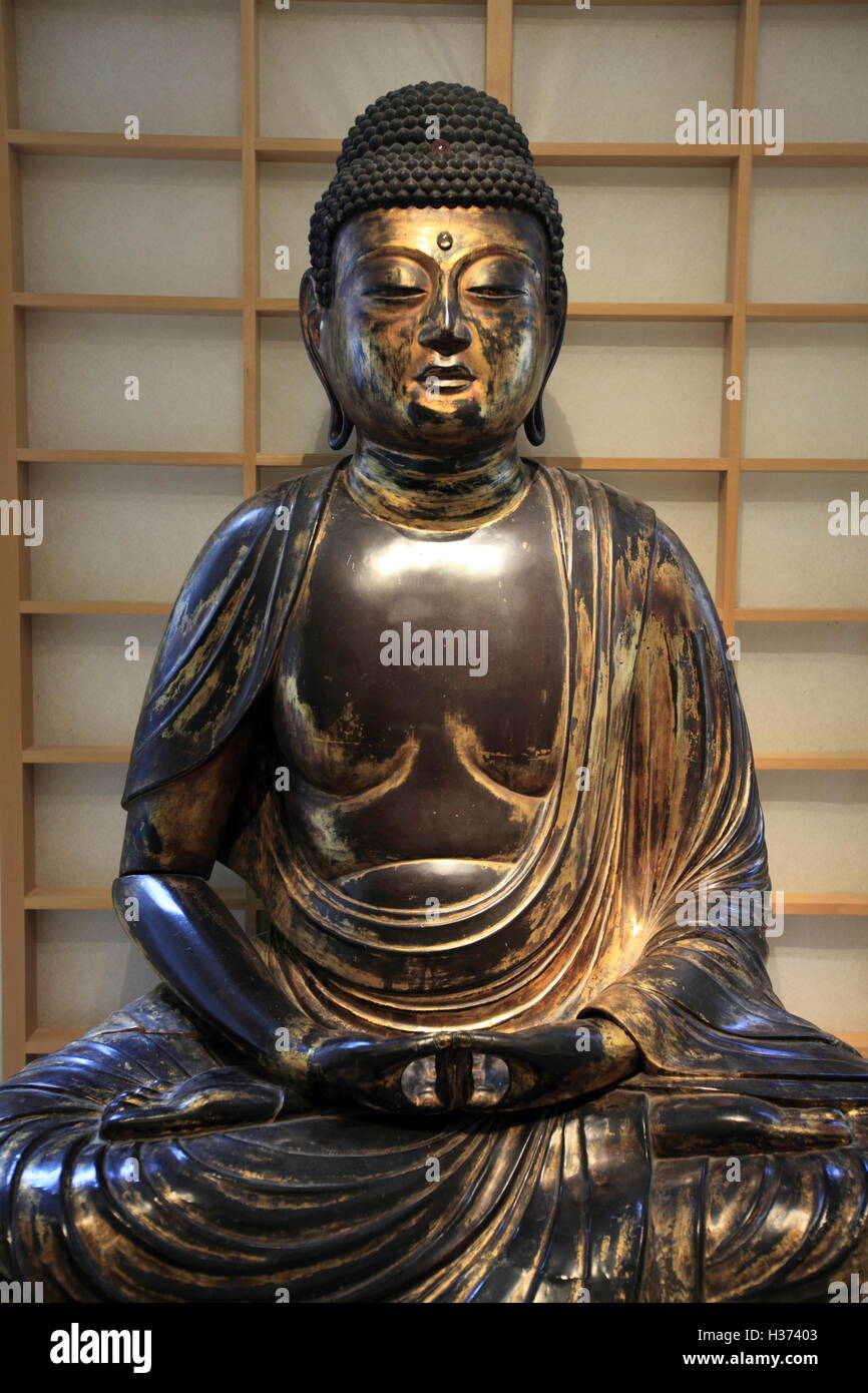 A closed up view of an antique Japanese Amida Buddha in Galeries du ...